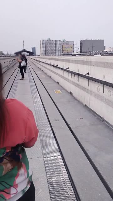 Passengers forced to walk along tracks when train breaks in Thailand ...