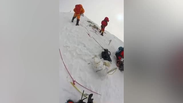 Veteran Sherpa guide, 54, scales Mount Everest for record 30th time ...