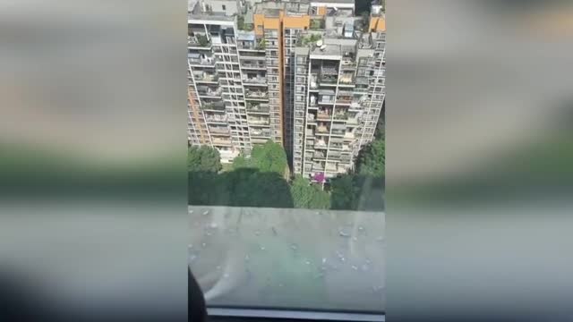 High-rise flats uninhabitable after windows mysteriously explode ...