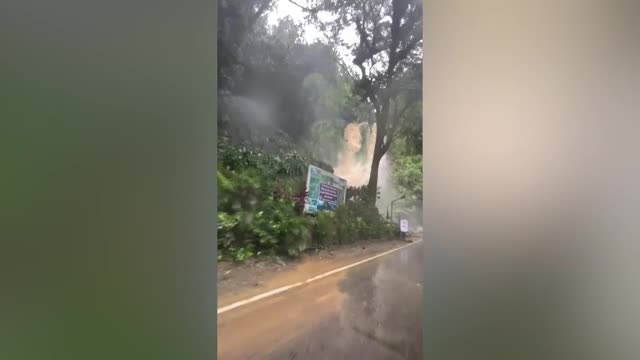 Flash floods cascade down waterfall as tropical storm Gaemi intensifies ...